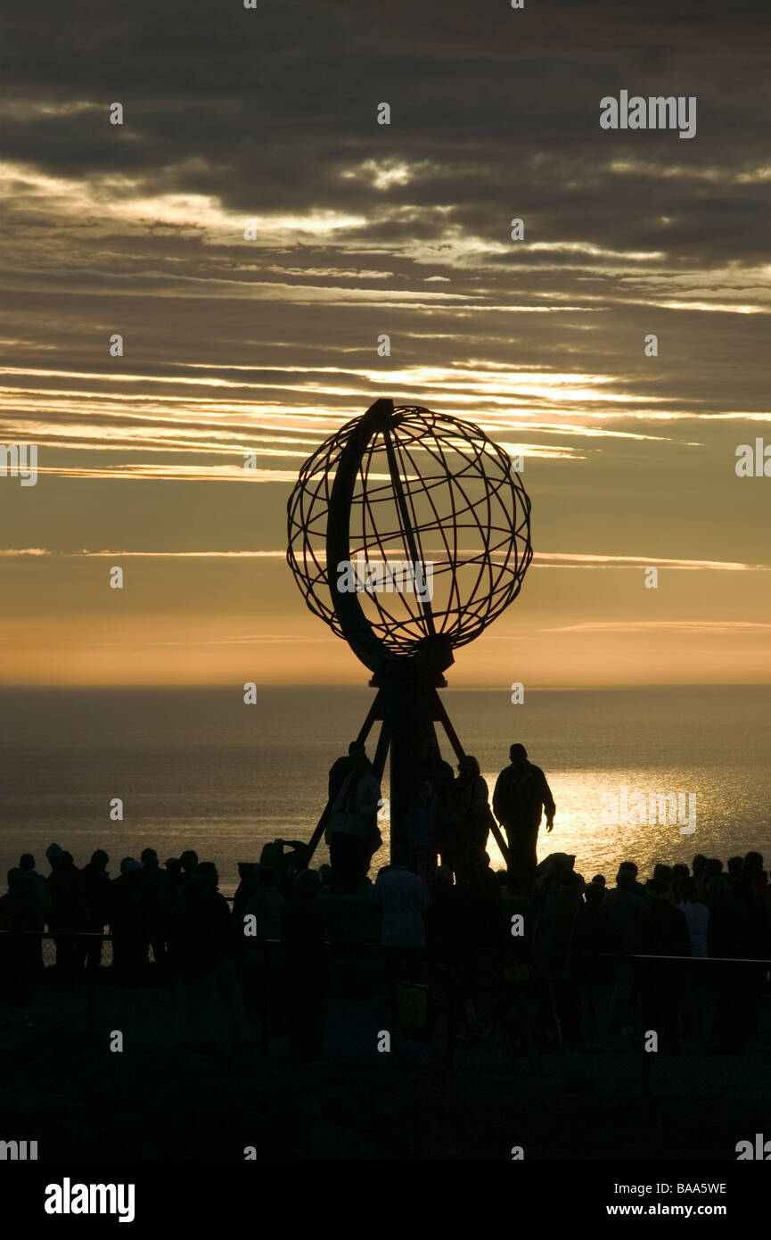 Midnight sun and silhouette people in background hi-res stock ...