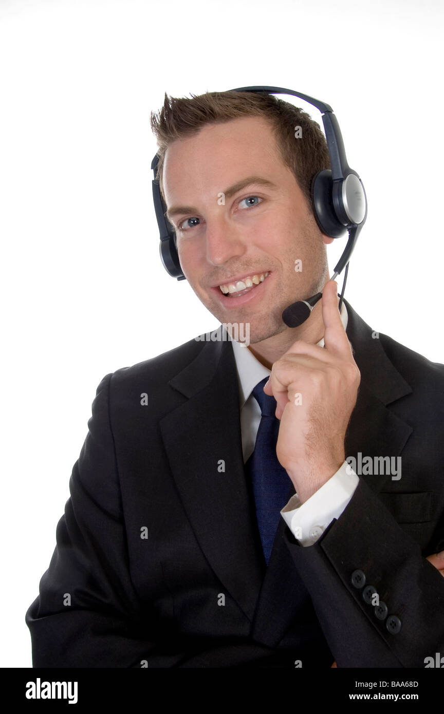 young man calling with headset and smiling Stock Photo - Alamy