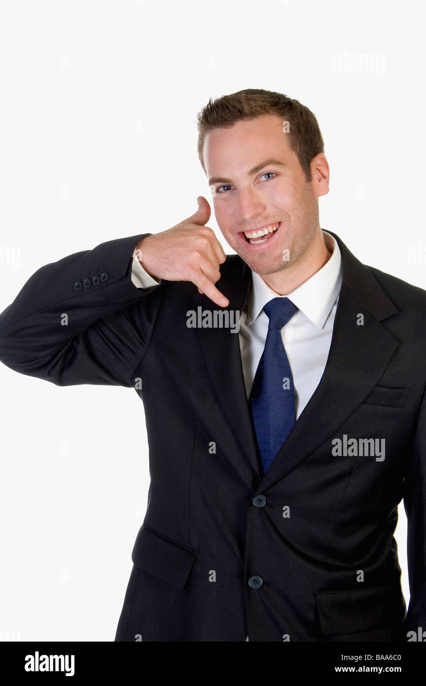 businessman posing calling hand gesture Stock Photo - Alamy