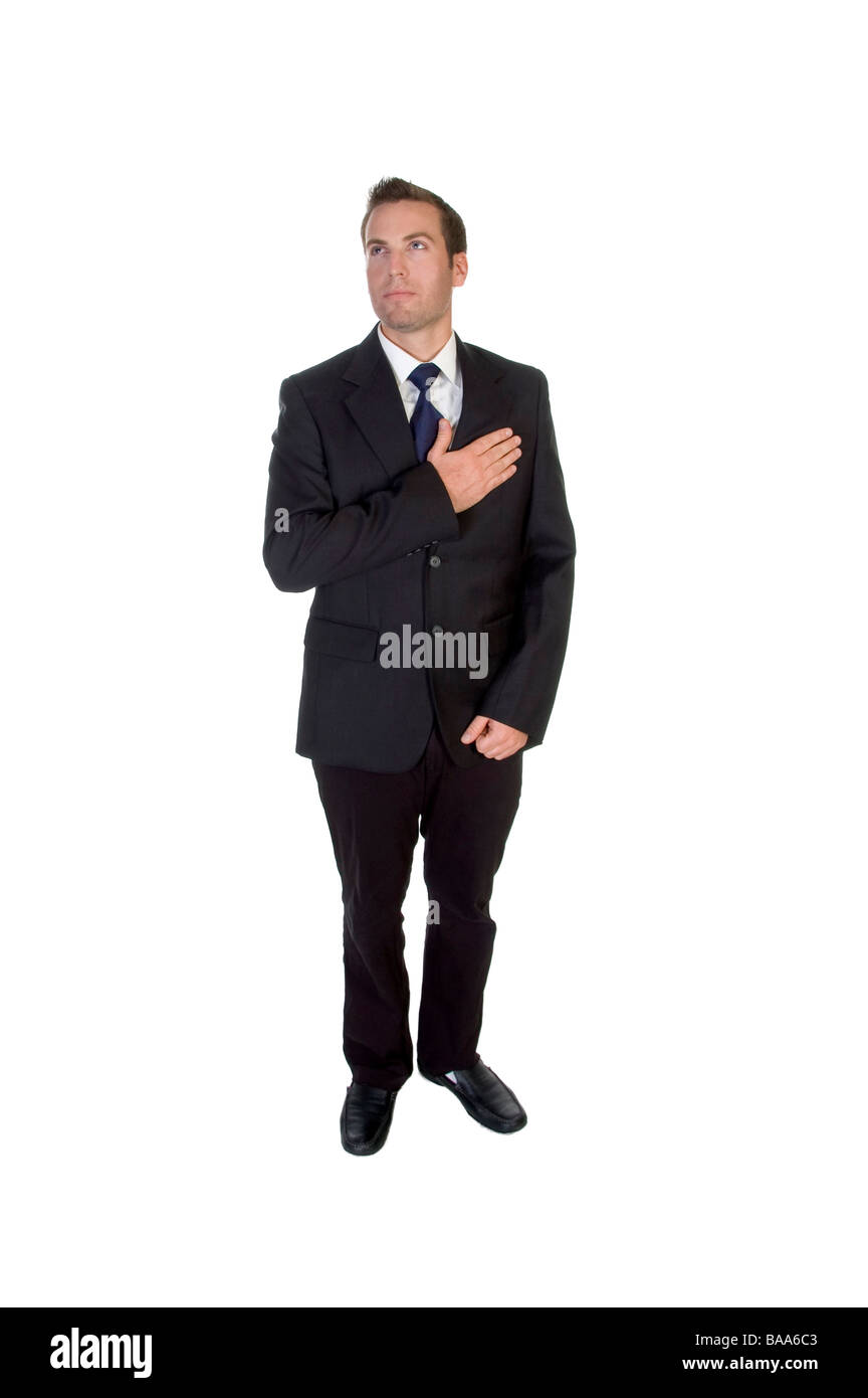 standing businessman saluting by heart Stock Photo - Alamy
