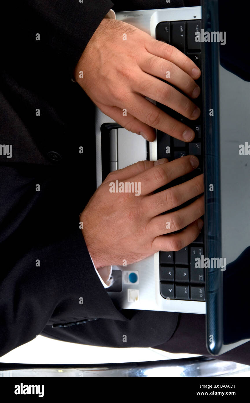 man hands busy with laptop Stock Photo - Alamy