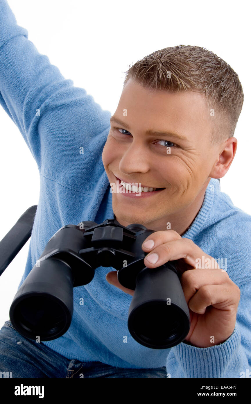 smiling young man with binocular Stock Photo - Alamy
