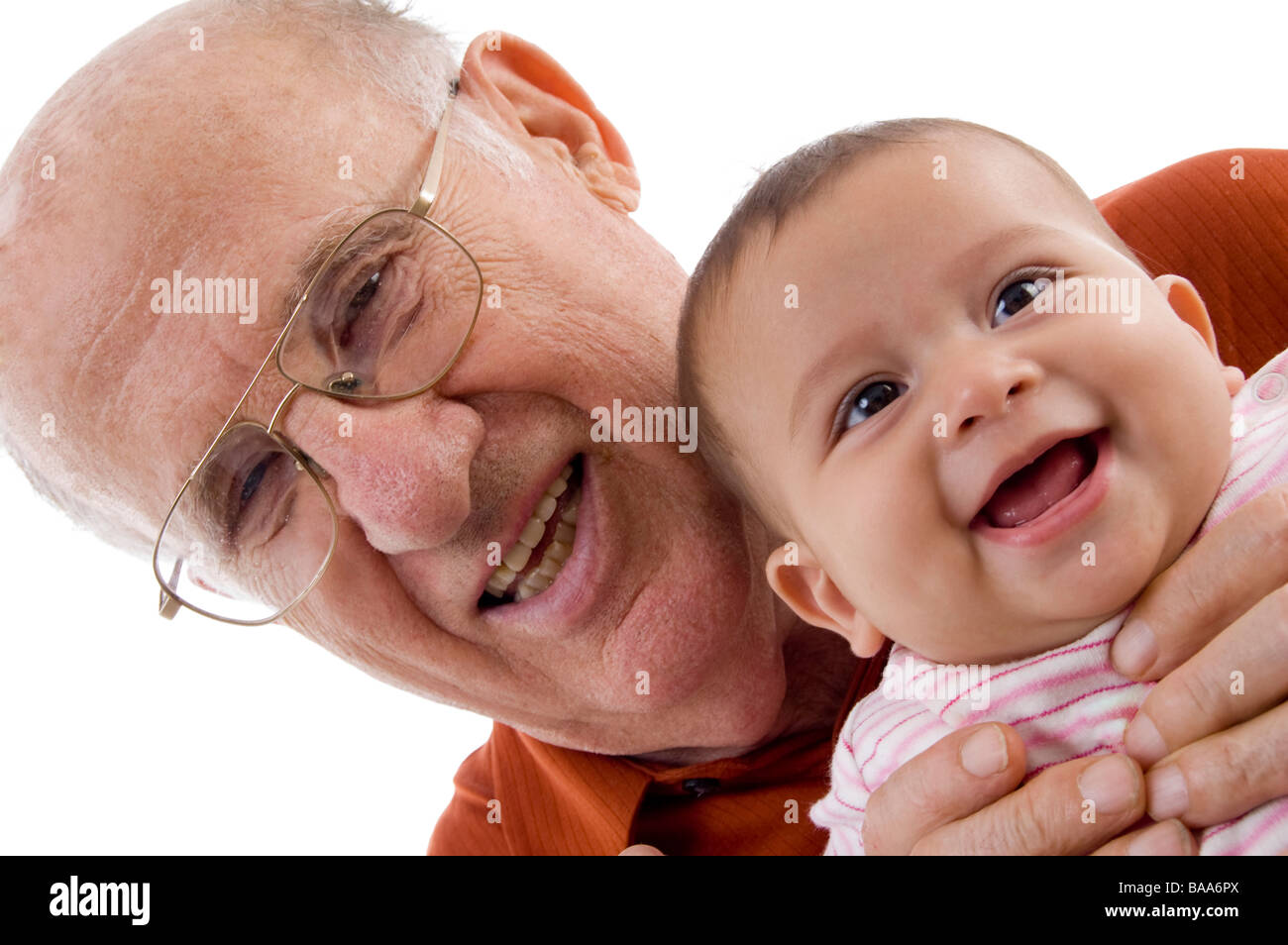 old man holding the cute baby Stock Photo - Alamy