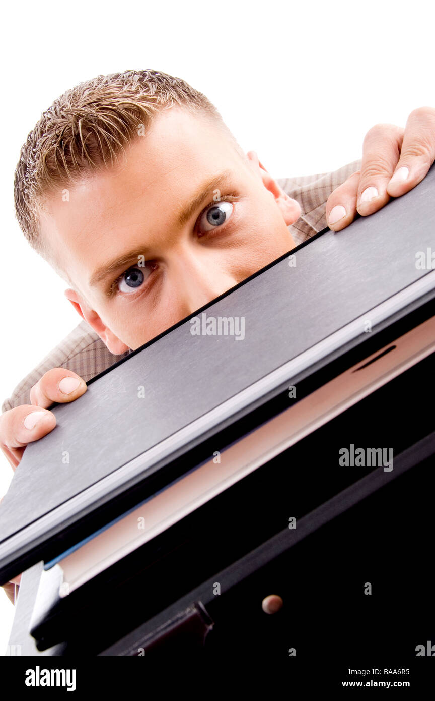 man peeping from files Stock Photo - Alamy