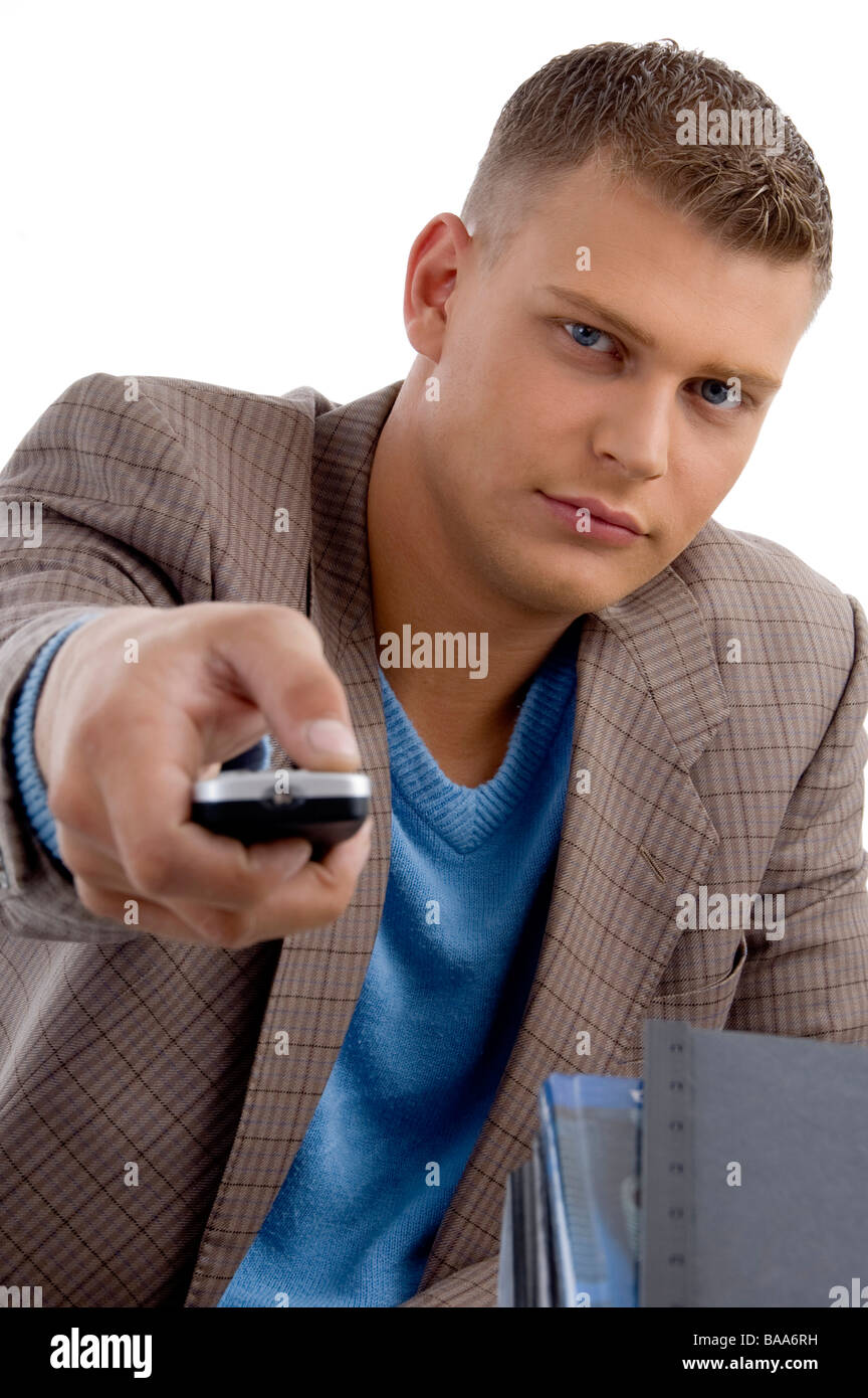 young man with remote control Stock Photo - Alamy
