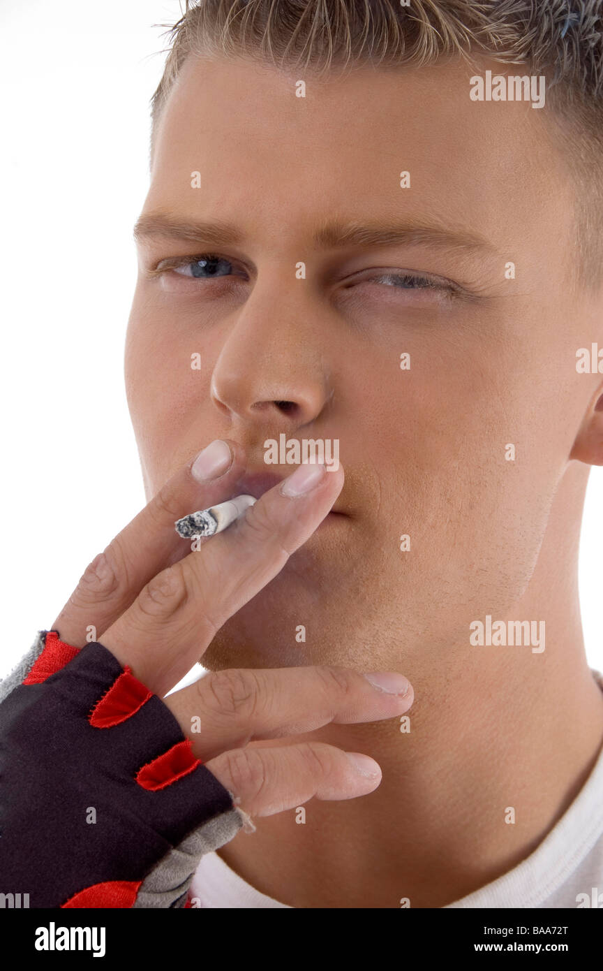 sportive guy smoking Stock Photo - Alamy