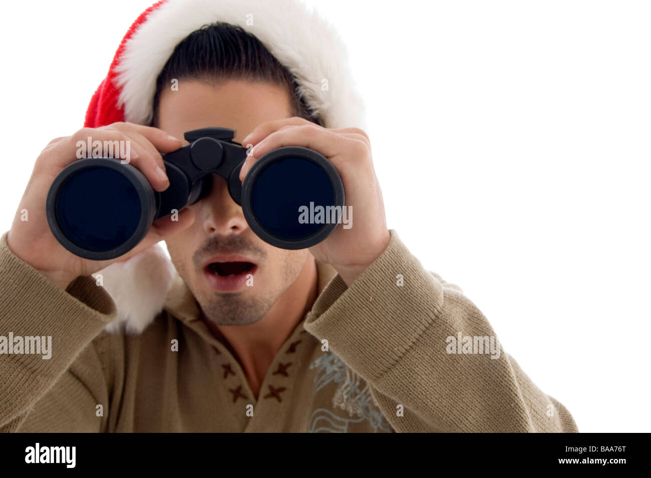 handsome guy looking into binoculars and surprised Stock Photo - Alamy