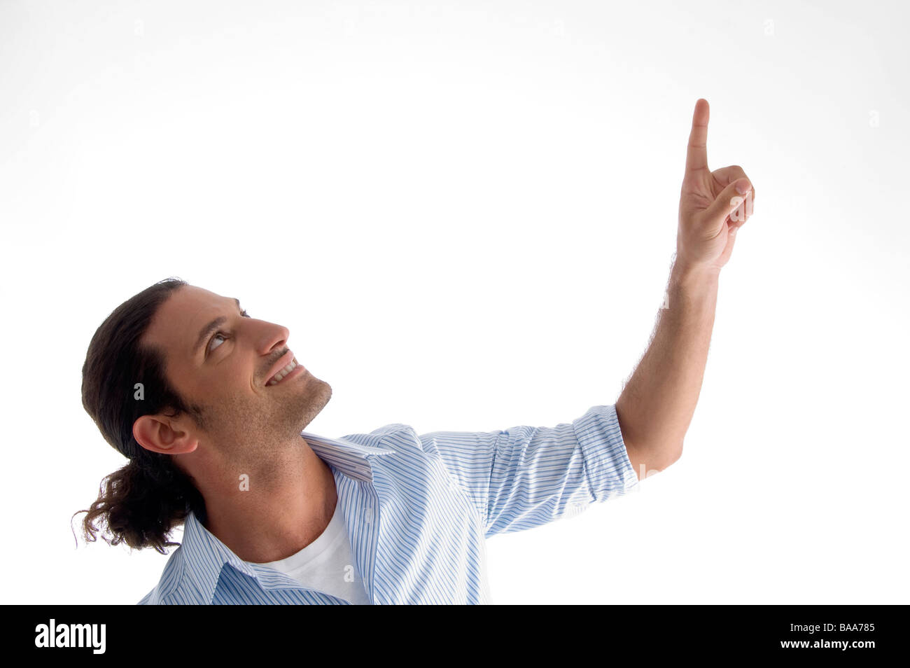 cool young guy pointing upwards Stock Photo - Alamy