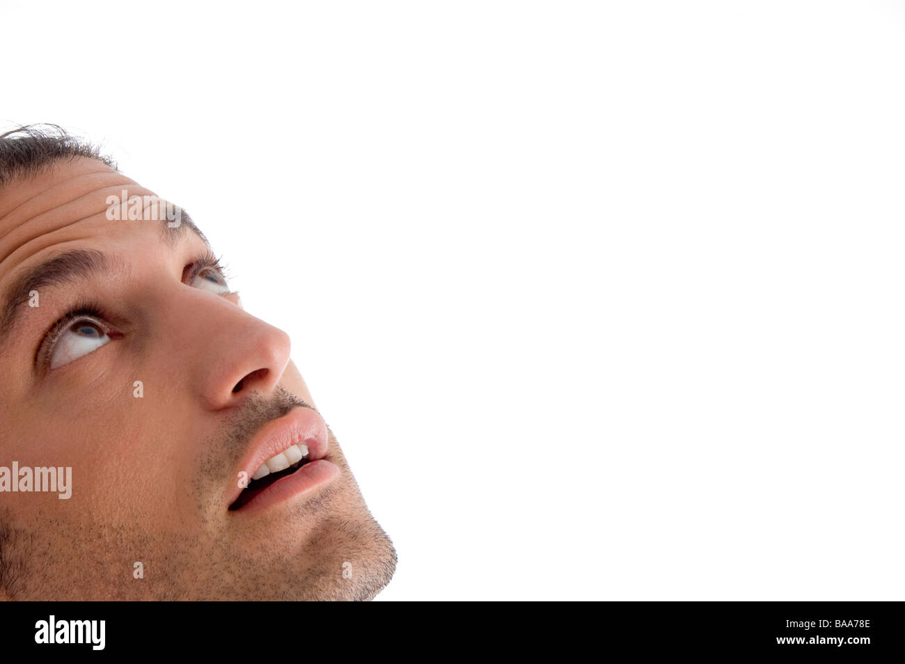 young guy looking at corner Stock Photo - Alamy