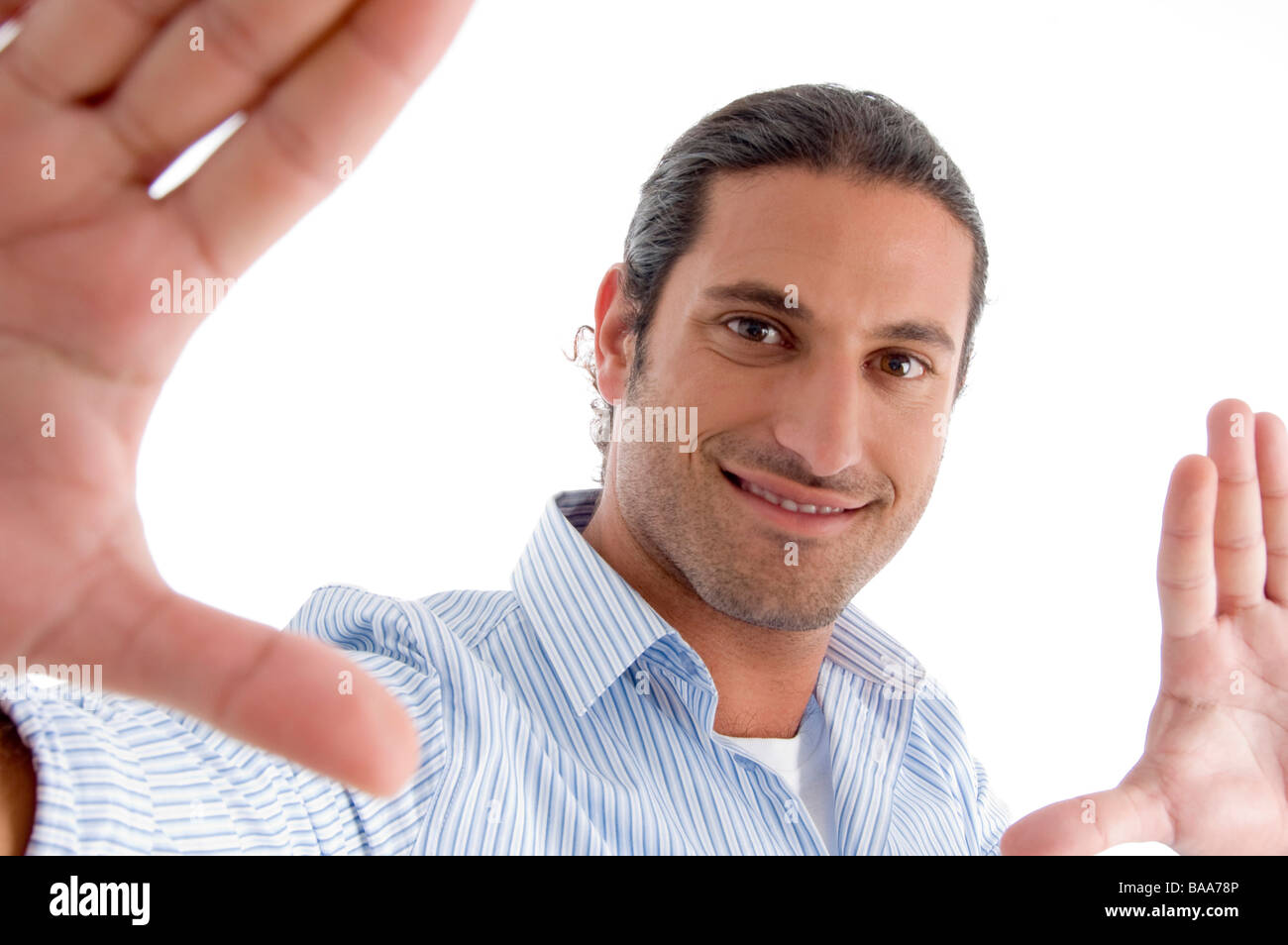 young man making frame with hand gesture Stock Photo - Alamy