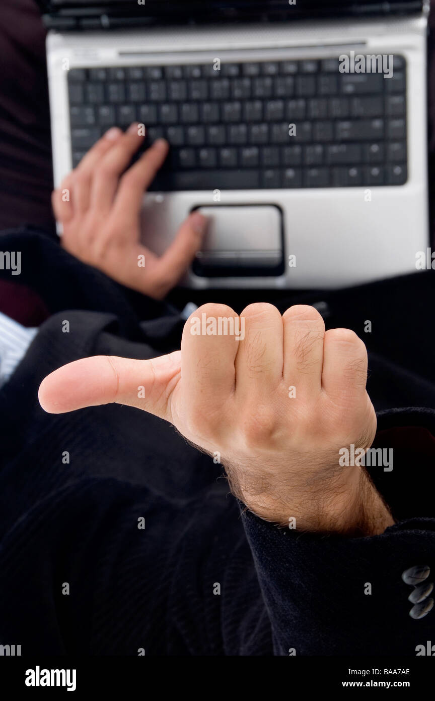 businessman gesturing thumbs up Stock Photo - Alamy