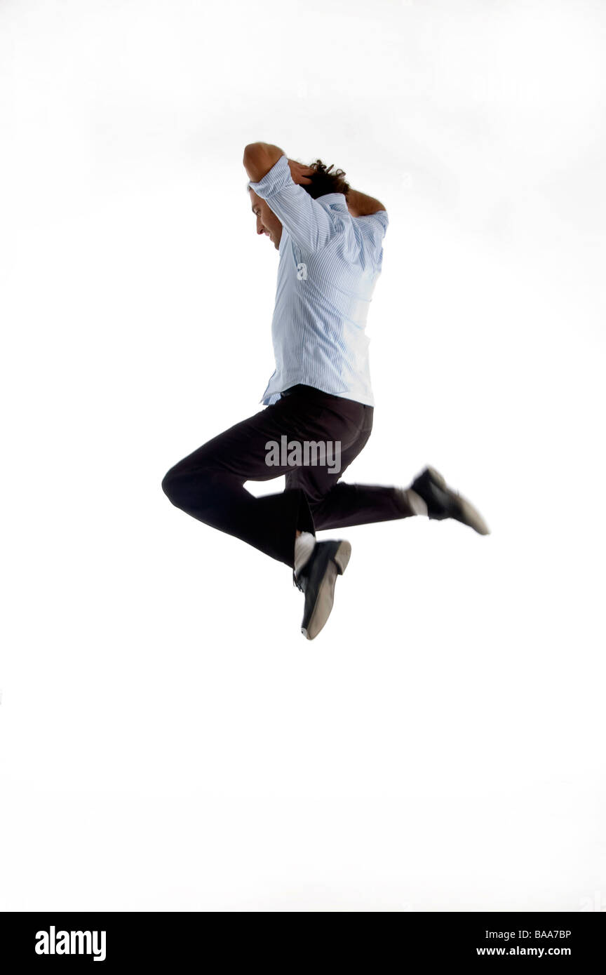 handsome model making a difficult jump Stock Photo - Alamy