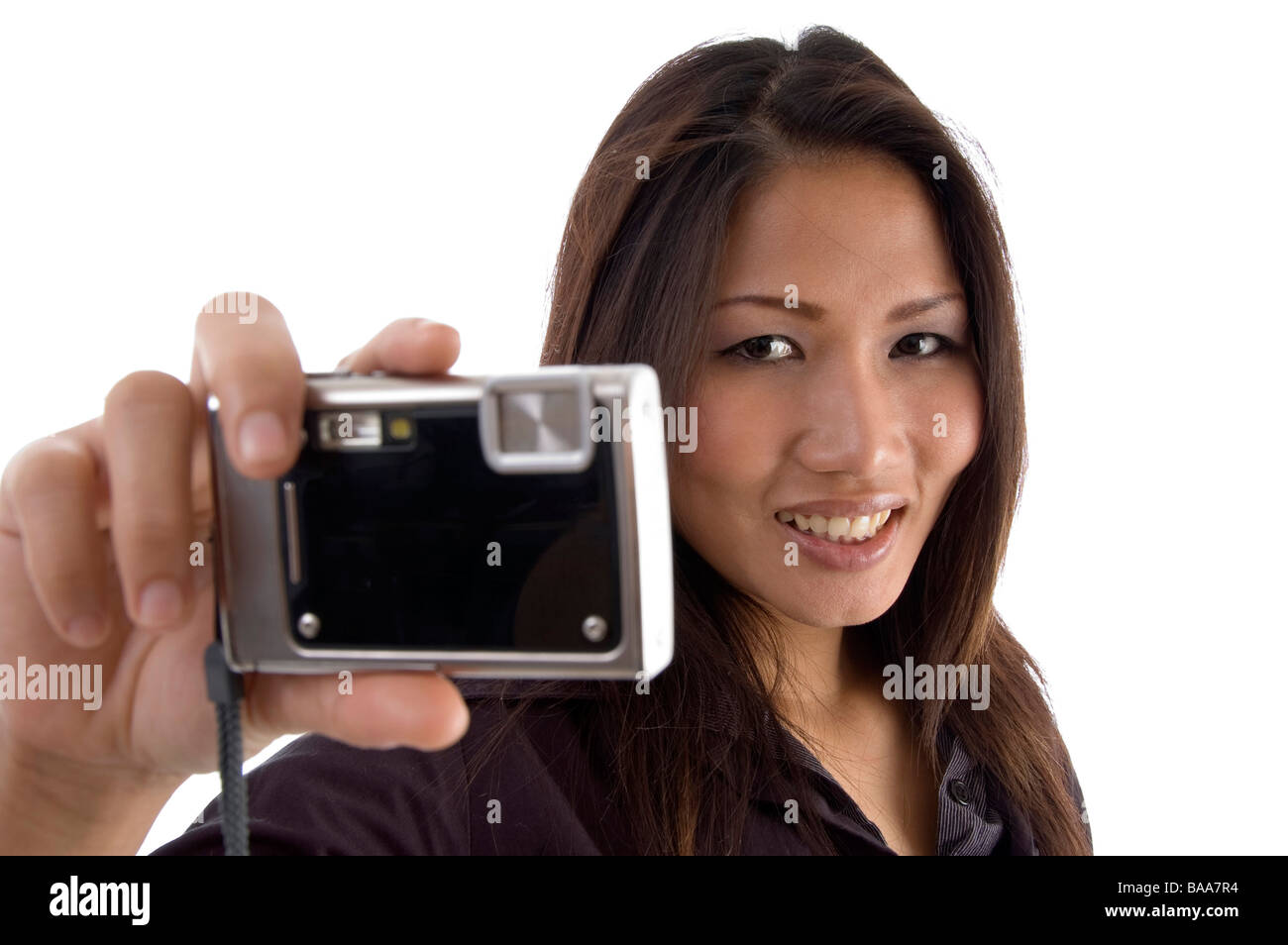 smiling female showing camera Stock Photo - Alamy