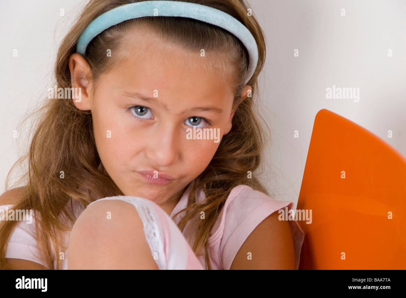 little girl giving attitude expression Stock Photo - Alamy