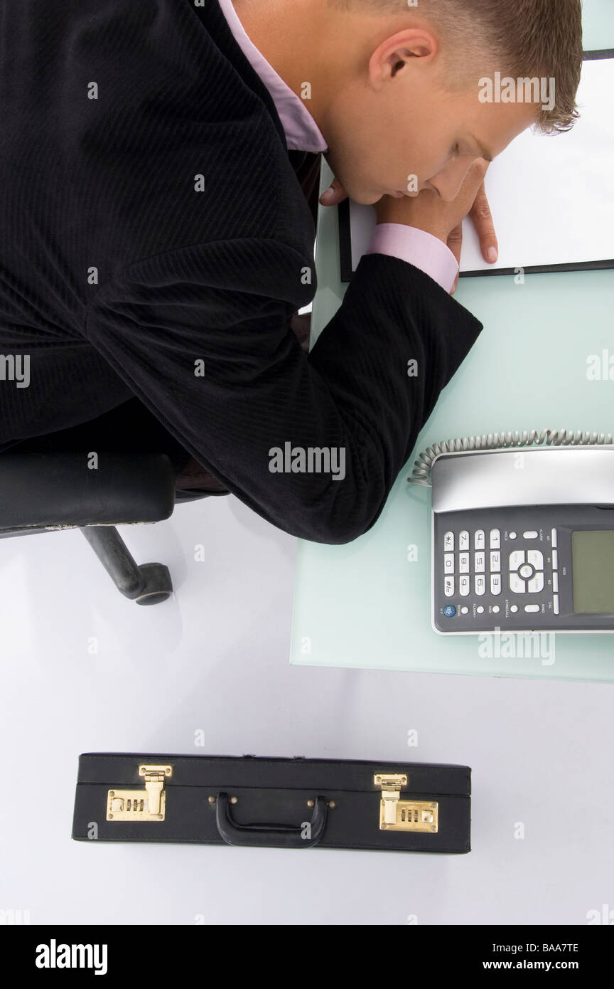 sleeping young lawyer in office Stock Photo - Alamy