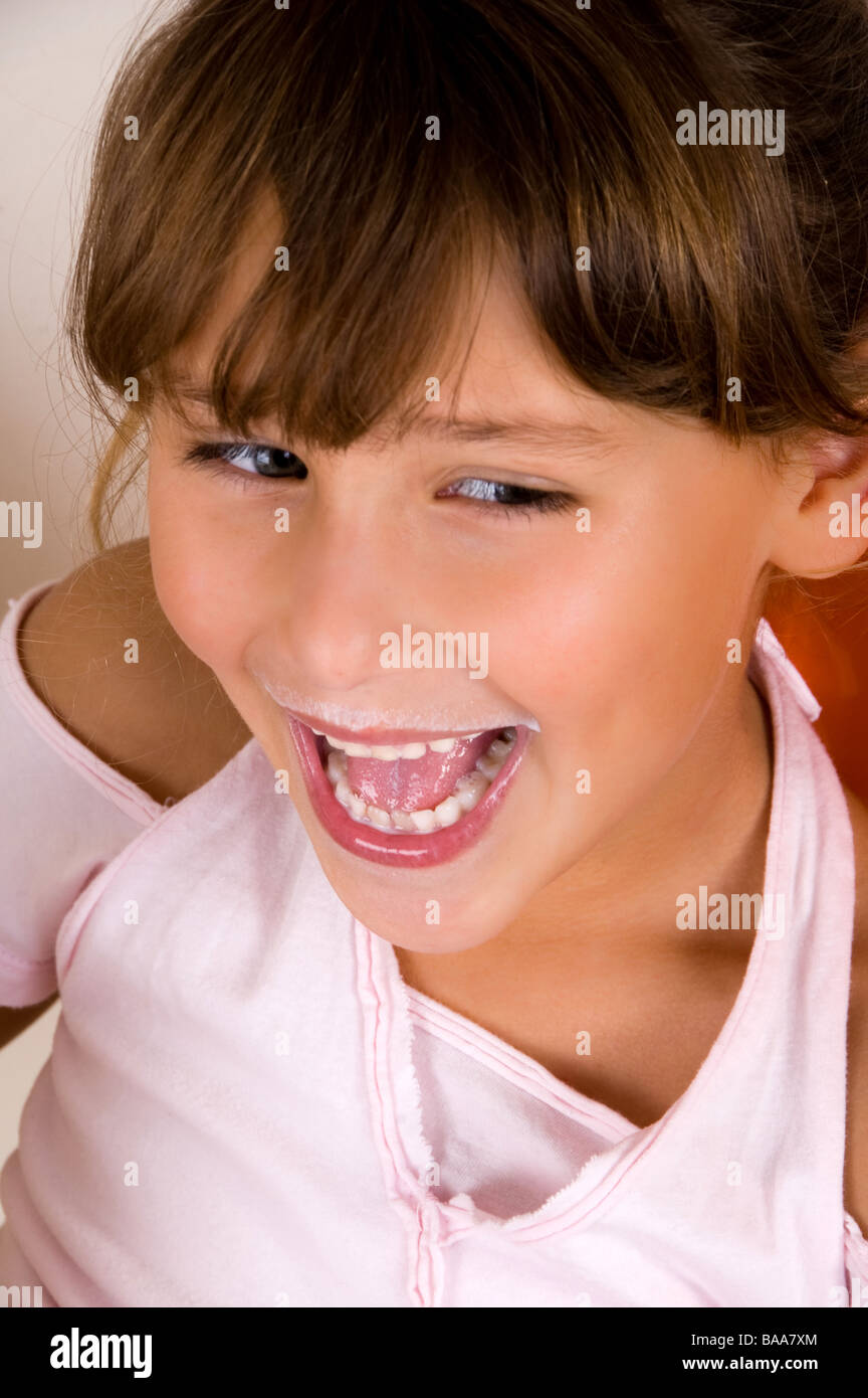 laughing little girl looking side Stock Photo - Alamy