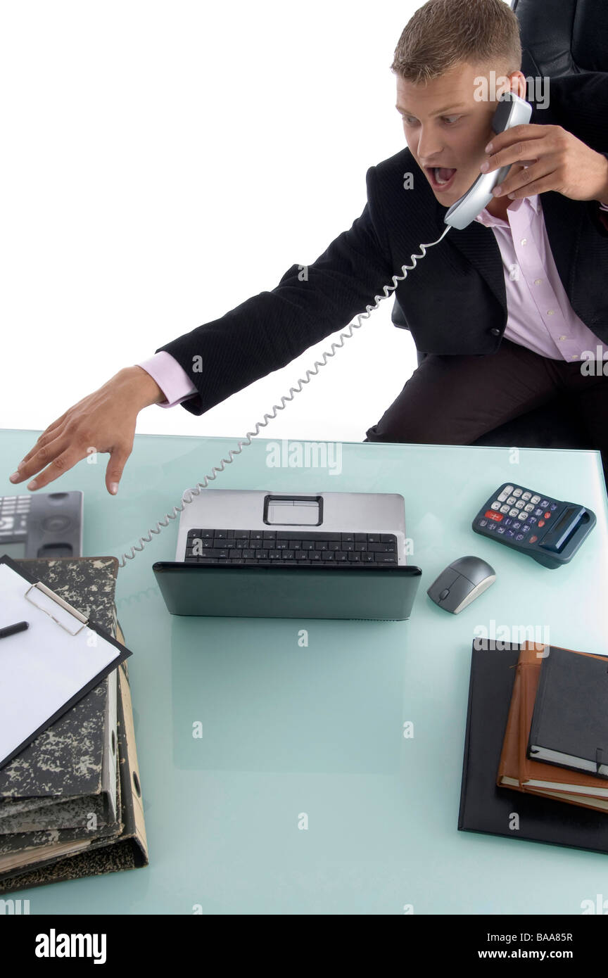 sitting businessman busy on the phone Stock Photo - Alamy