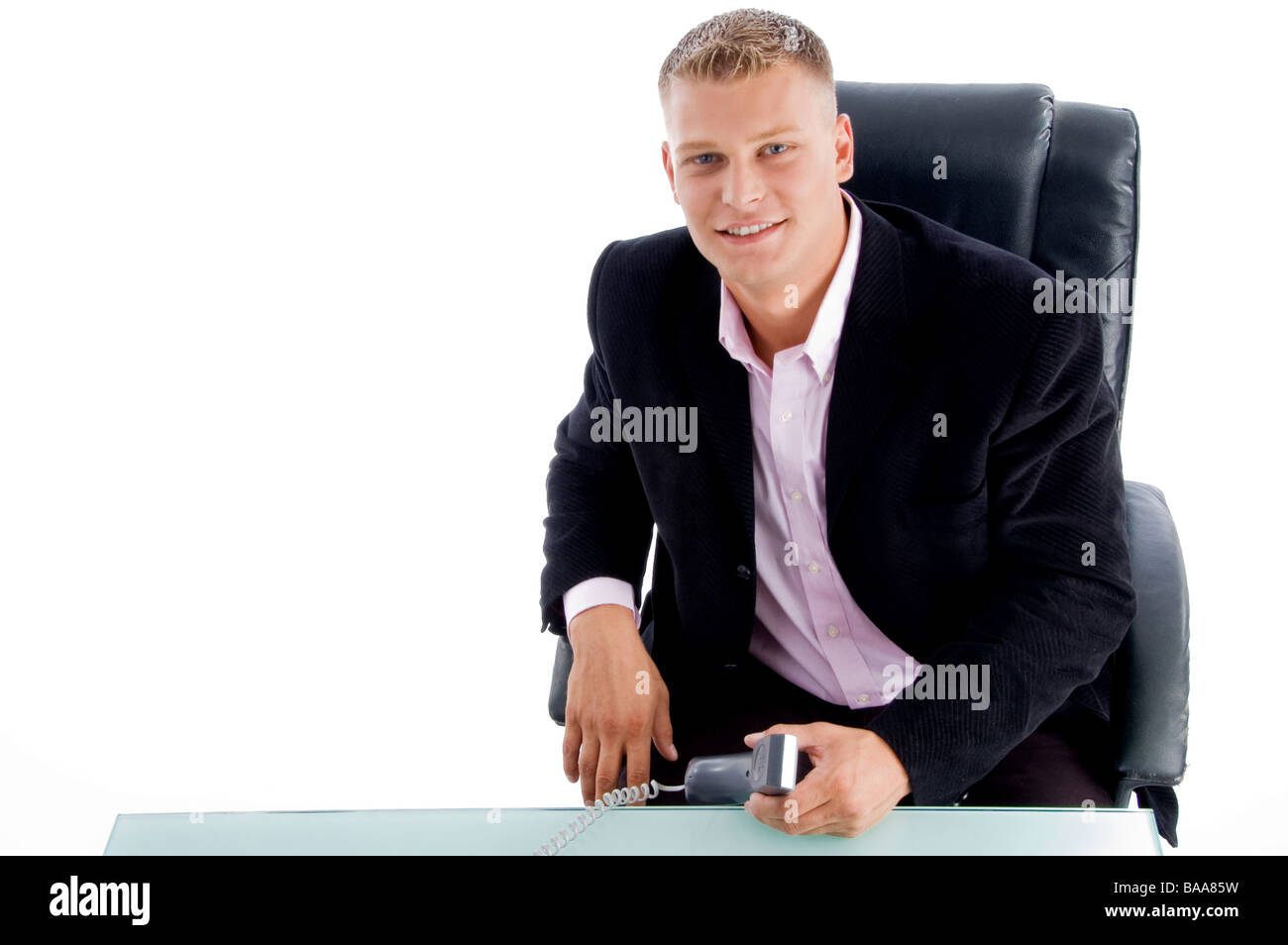 smiling young professional at office desk Stock Photo - Alamy