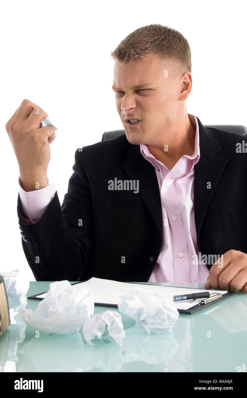 angry businessman crushing the paper Stock Photo - Alamy