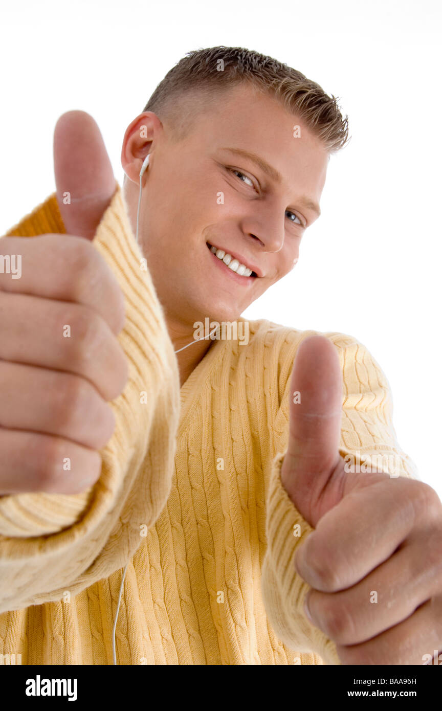 smiling guy showing good luck sign with both hands Stock Photo - Alamy