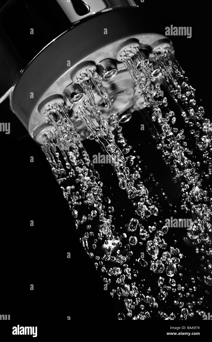 Shower with water isolated on a black background Stock Photo - Alamy