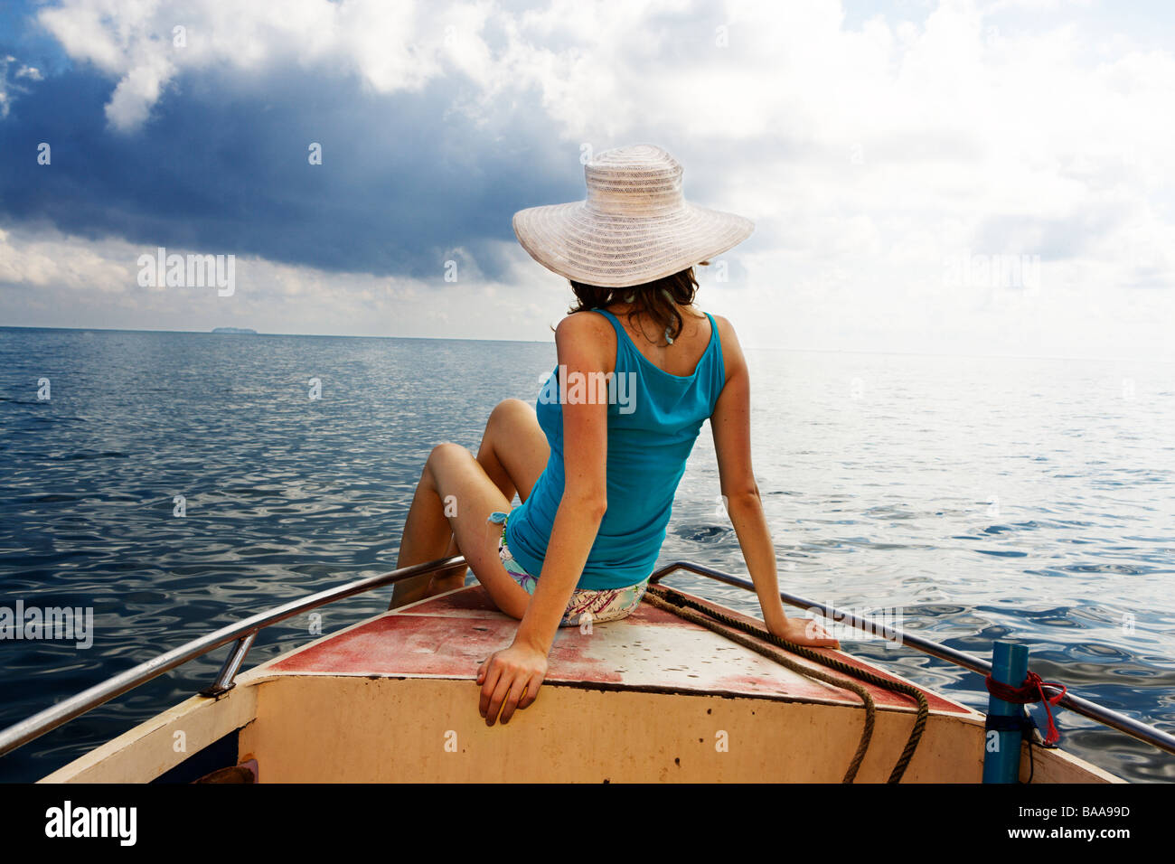 Lady on boat sits hi-res stock photography and images - Alamy