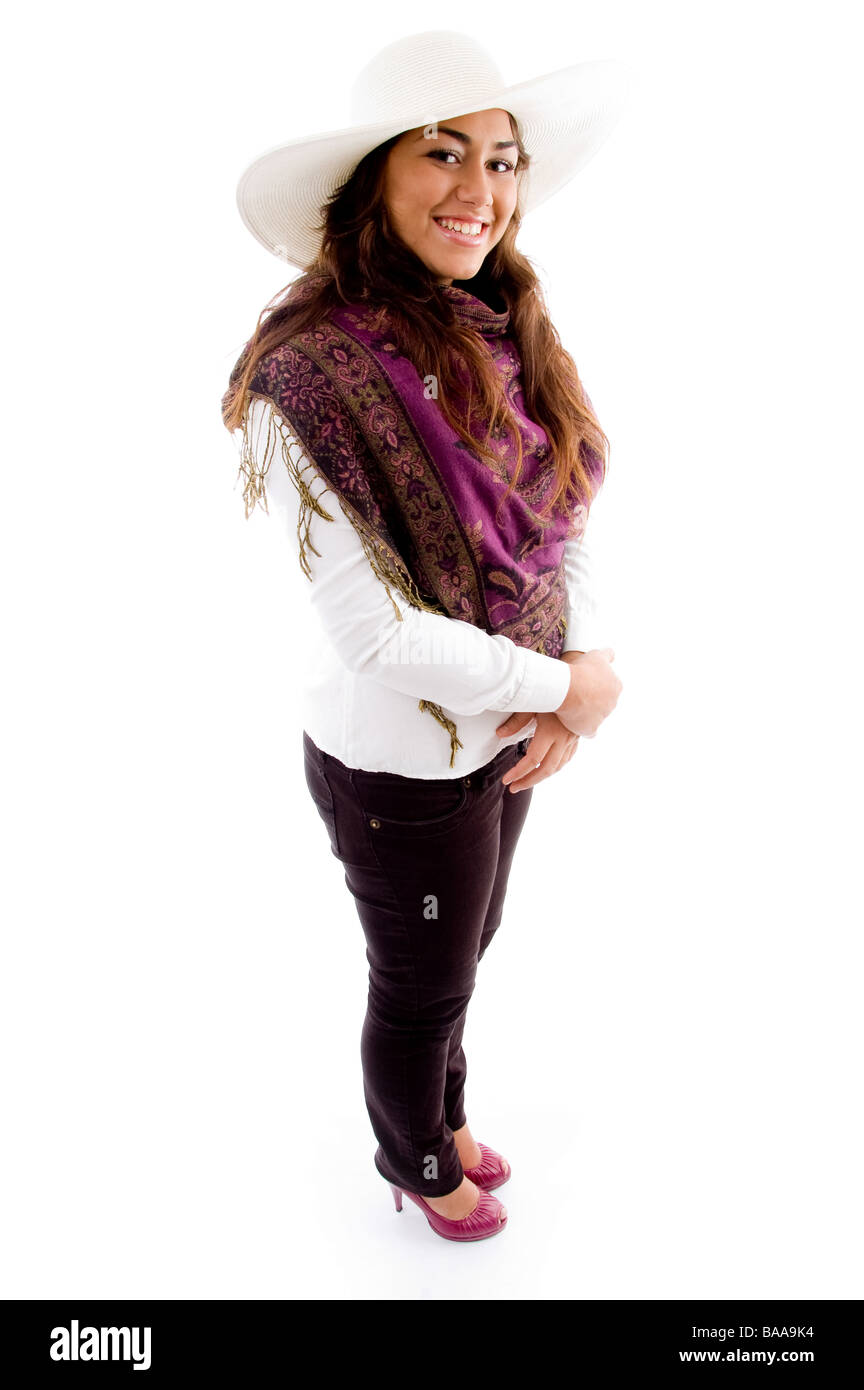 side pose of standing woman looking at camera Stock Photo - Alamy