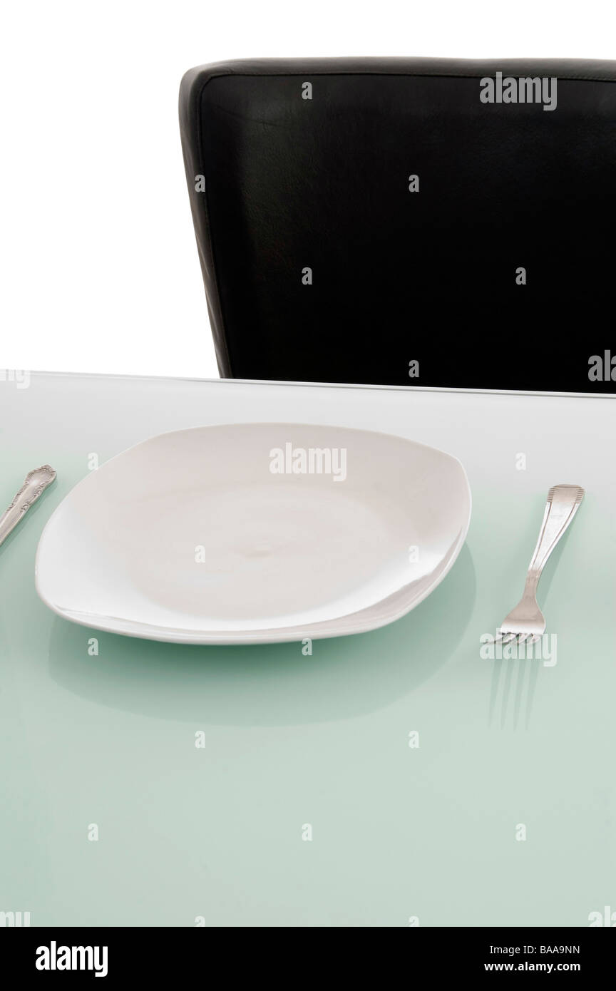 plates on dinning table Stock Photo - Alamy