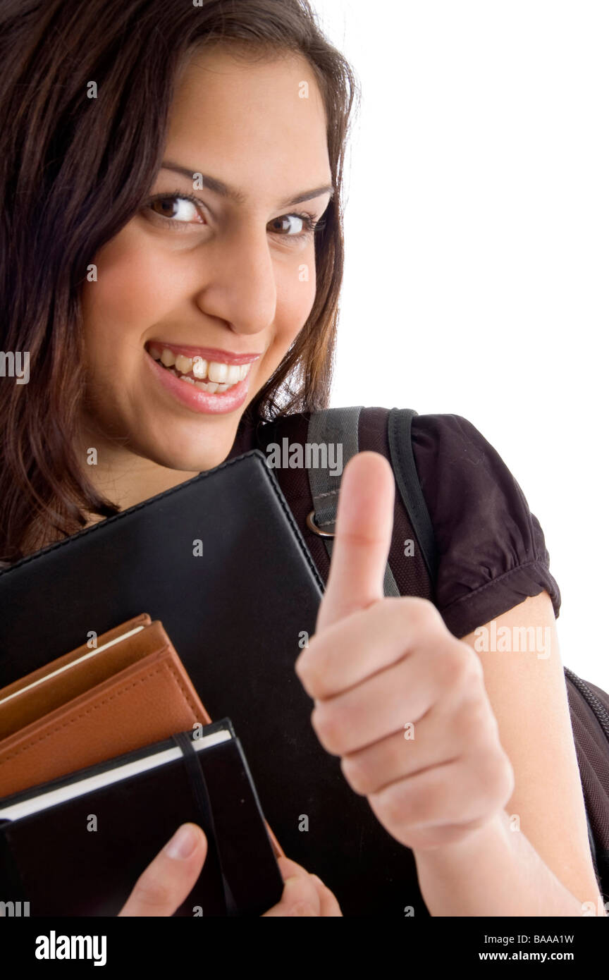 smiling college student showing thumbs up Stock Photo - Alamy