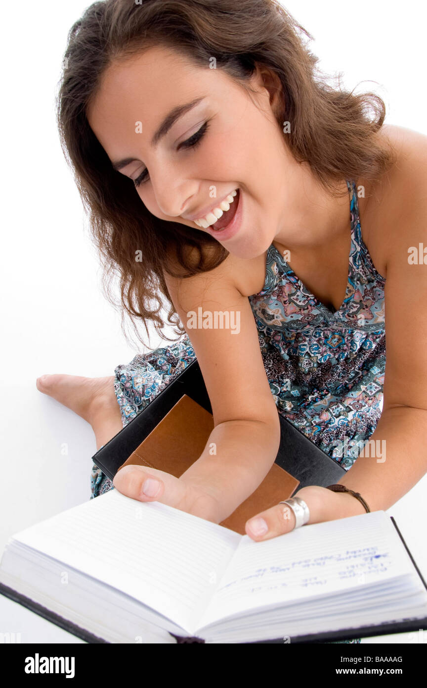 smiling young student reading book Stock Photo - Alamy