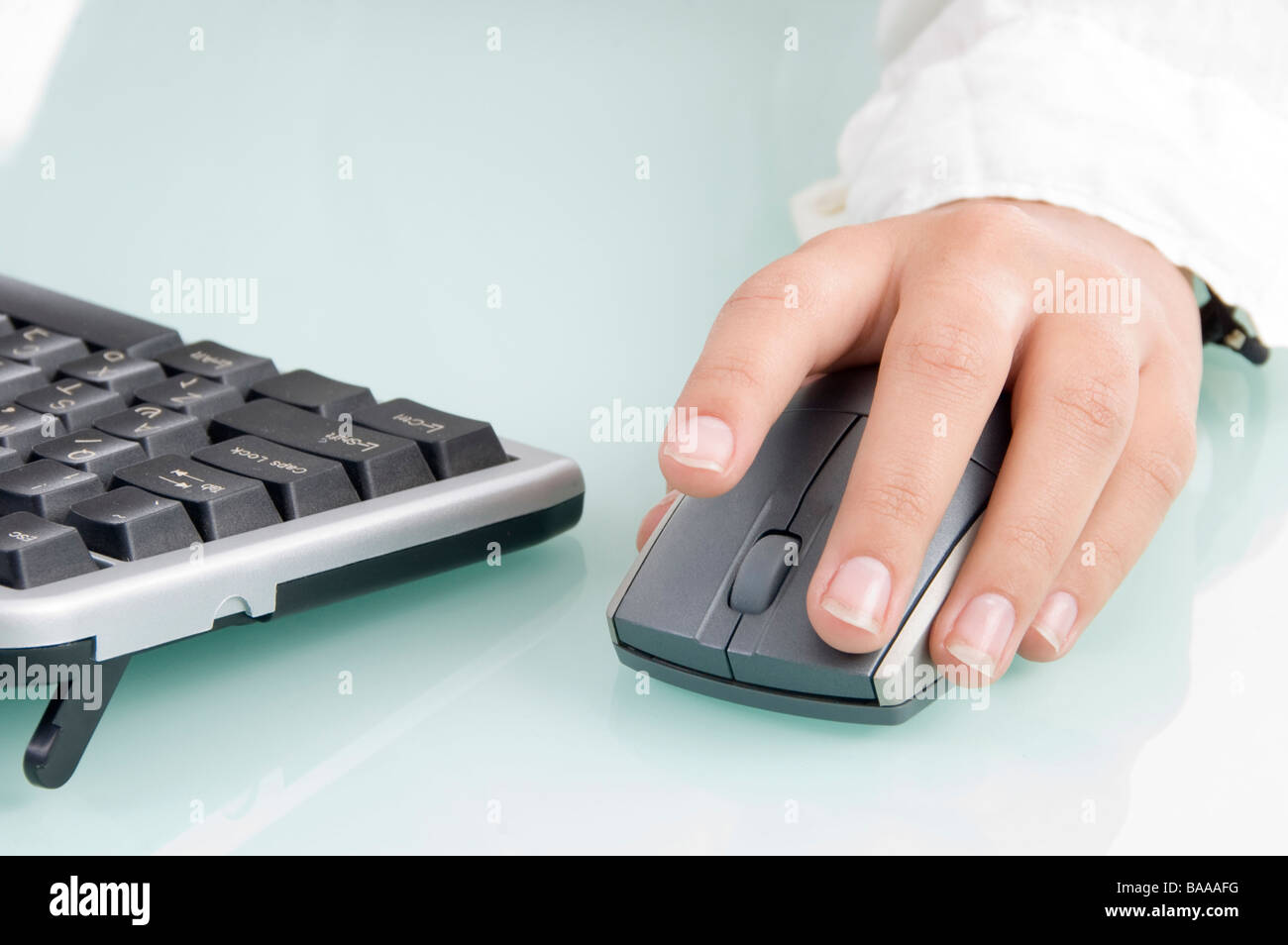 mouse in woman's hand Stock Photo - Alamy