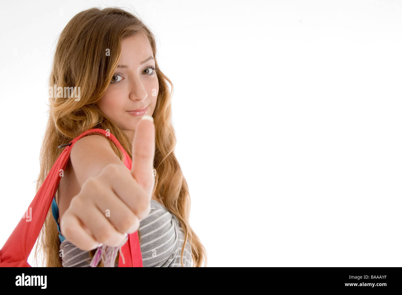 beautiful girl showing thumbs up hand gesture Stock Photo - Alamy