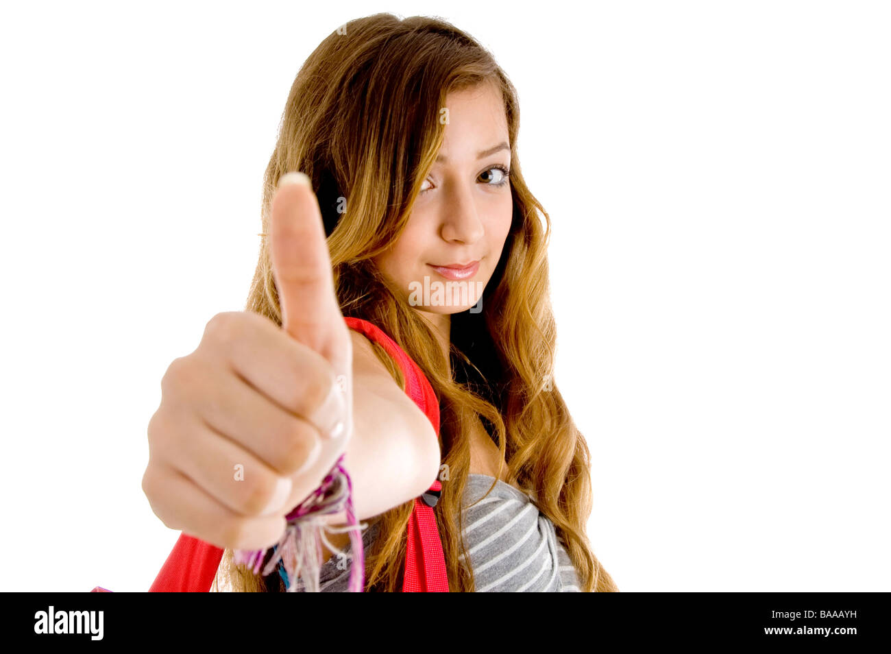 beautiful teenager school girl showing thumbs up Stock Photo - Alamy