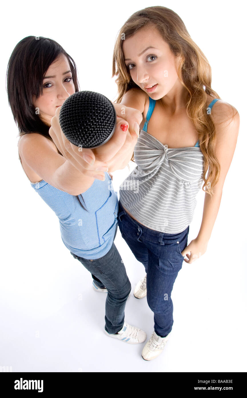 young girls showing microphone Stock Photo - Alamy