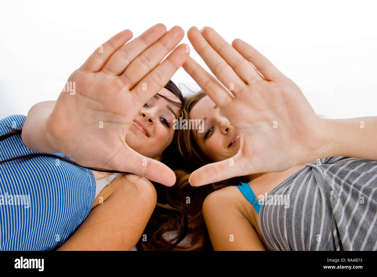 girls showing hand gesture Stock Photo - Alamy