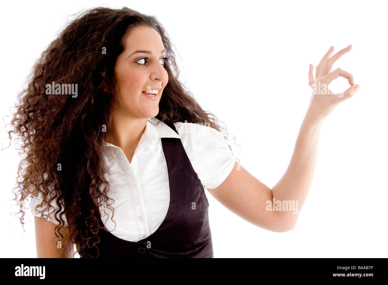 cute woman showing okay hand gesture Stock Photo - Alamy