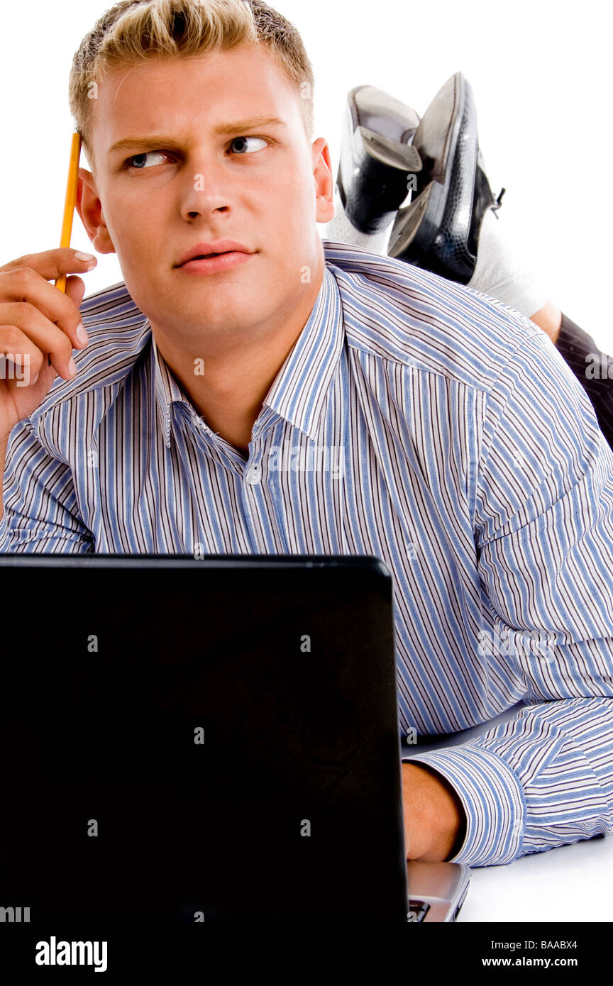 thinking man with laptop and pencil Stock Photo - Alamy