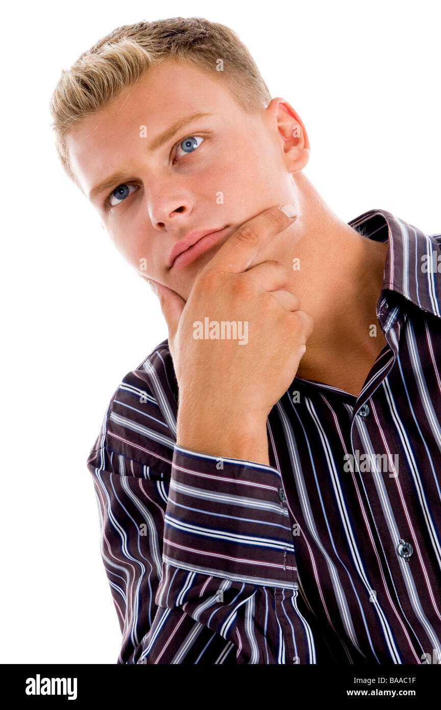 young man sitting and facing the camera Stock Photo - Alamy