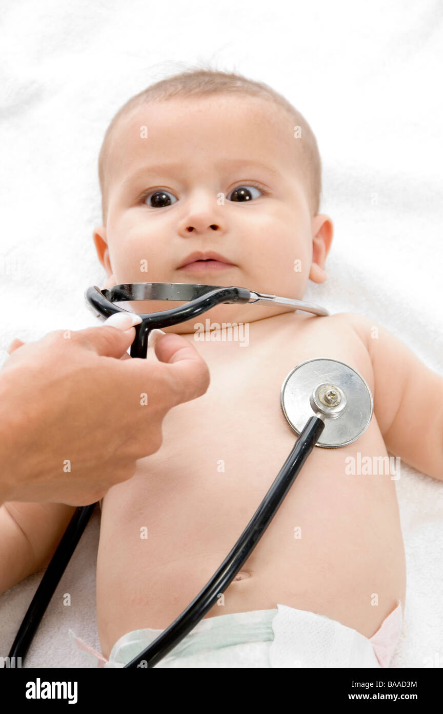 doctor's hand examine of young baby Stock Photo - Alamy