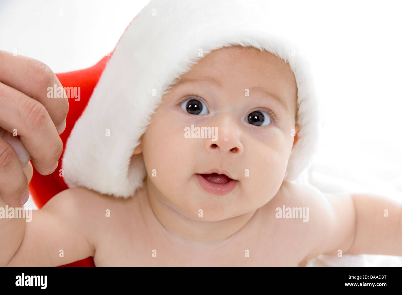 little santa looking at camera Stock Photo - Alamy