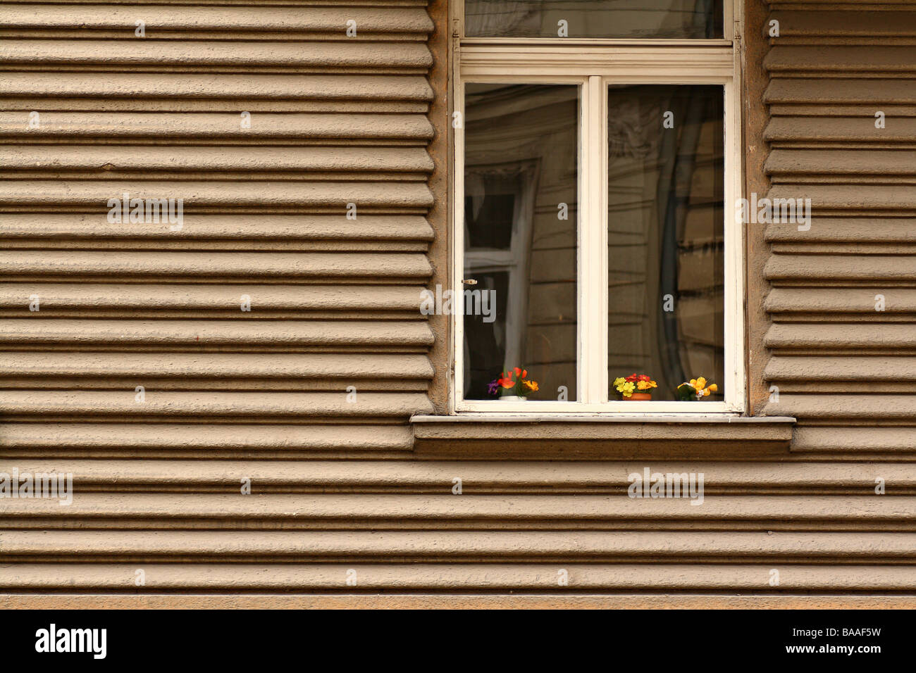 Window on striped wall Stock Photo - Alamy