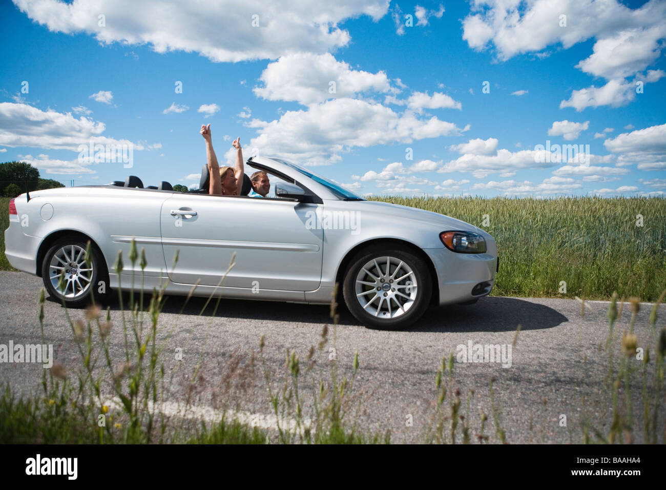 Two people in a car, Sweden Stock Photo - Alamy