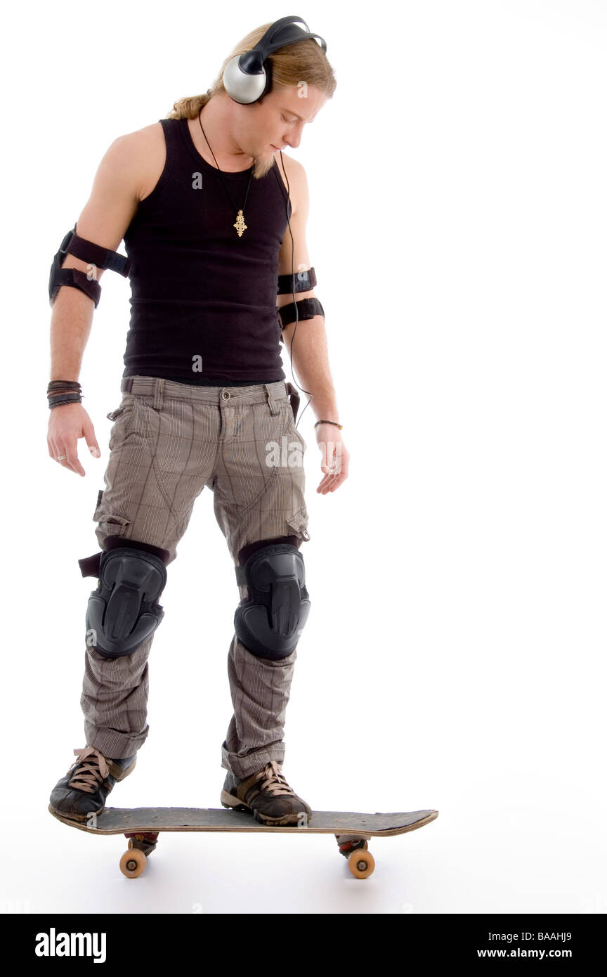 young male model skating on the floor Stock Photo - Alamy