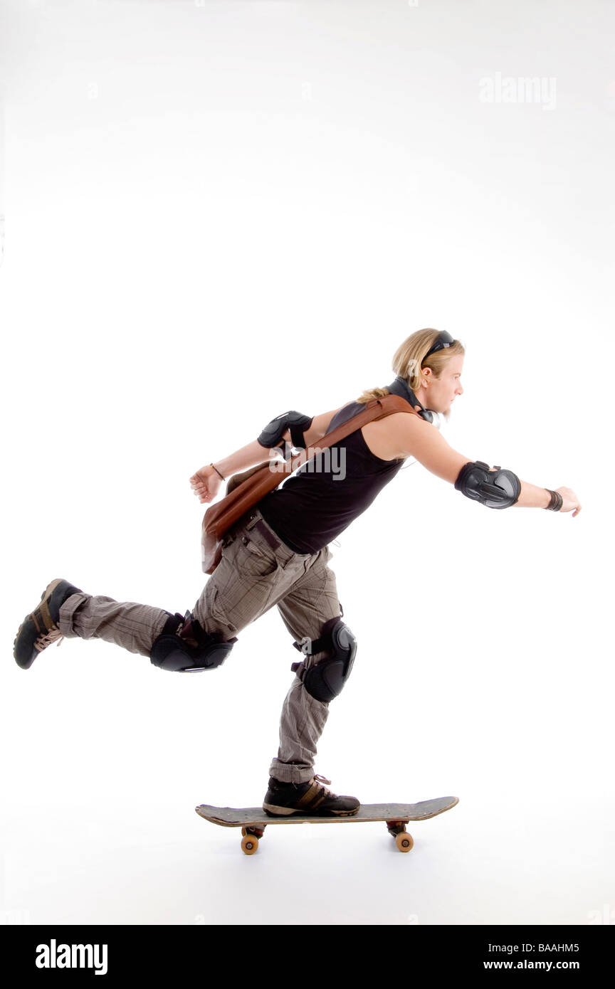 young student enjoying skateboarding Stock Photo - Alamy