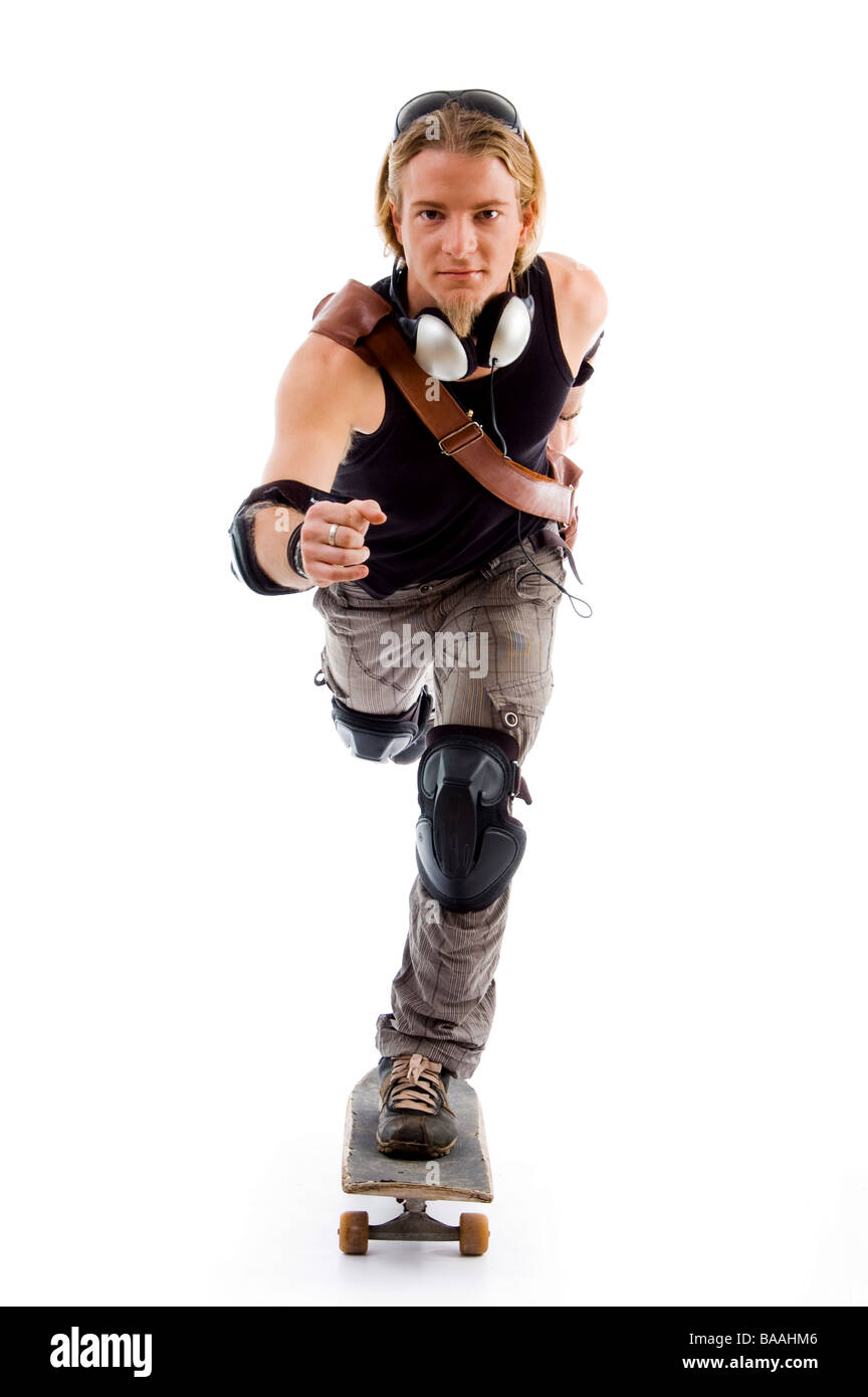 front view of male skater on skateboard Stock Photo - Alamy