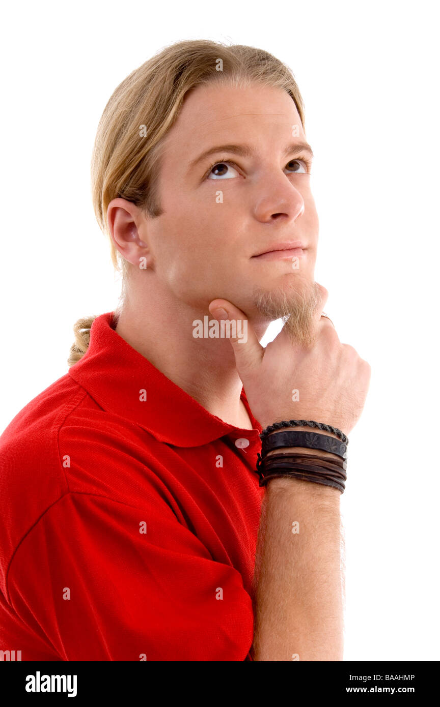 smart young man thinking and looking sideways Stock Photo - Alamy