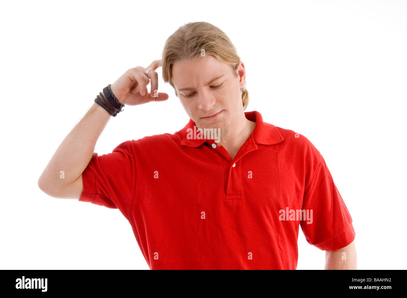 handsome young guy thinking hard Stock Photo - Alamy