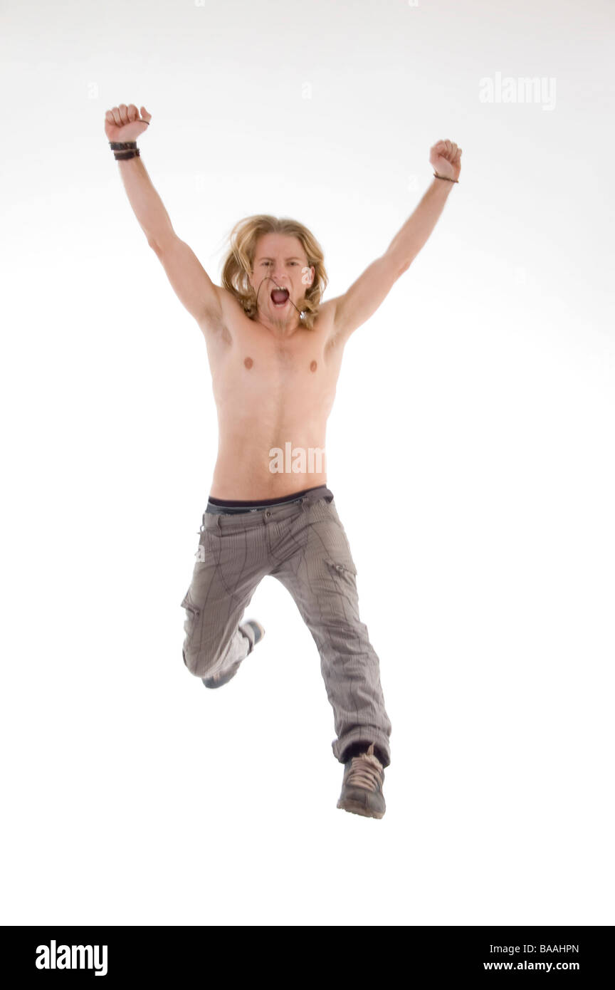 handsome male jumping high in joy Stock Photo - Alamy