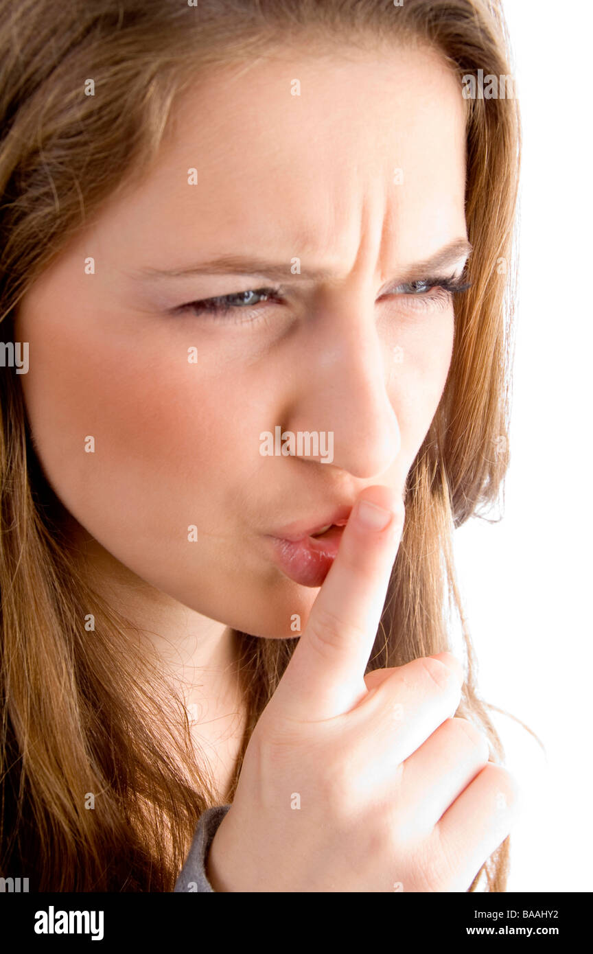teen female face showing keep shushing sign Stock Photo - Alamy