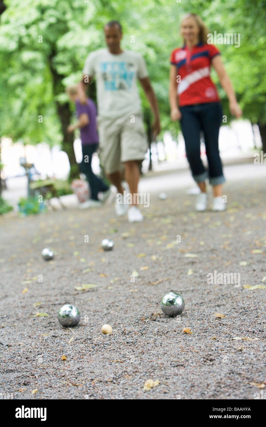 Three people playing boules stockholm hi-res stock photography and ...